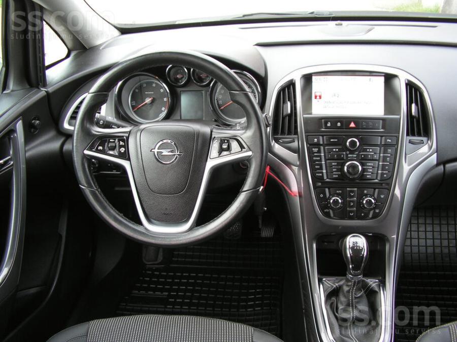 Black Opel Astra 2013 in Riga, with an engine capacity of 1.70 L and mileage of 182 thousand km for 5750 €, photo 15 on AUTOMOTO.COM.LV