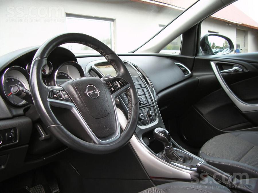 Black Opel Astra 2013 in Riga, with an engine capacity of 1.70 L and mileage of 182 thousand km for 5750 €, photo 17 on AUTOMOTO.COM.LV