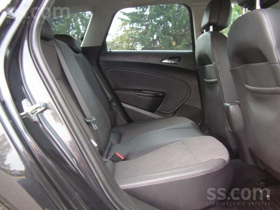 Black Opel Astra 2013 in Riga, with an engine capacity of 1.70 L and mileage of 182 thousand km for 5750 €, photo 22 on AUTOMOTO.COM.LV