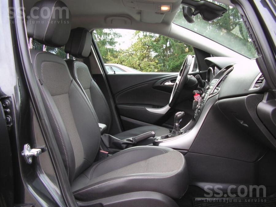 Black Opel Astra 2013 in Riga, with an engine capacity of 1.70 L and mileage of 182 thousand km for 5750 €, photo 23 on AUTOMOTO.COM.LV