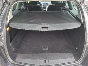 Black Opel Astra 2013 in Silute, with an engine capacity of 1.70 L and mileage of 215 thousand km for 3300 €, photo 13 on AUTOMOTO.COM.LV