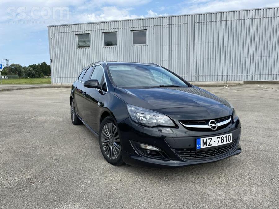 Black Opel Astra 2013 in Riga, with an engine capacity of 1.70 L and mileage of 260 thousand km for 4560 €, photo 1 on AUTOMOTO.COM.LV