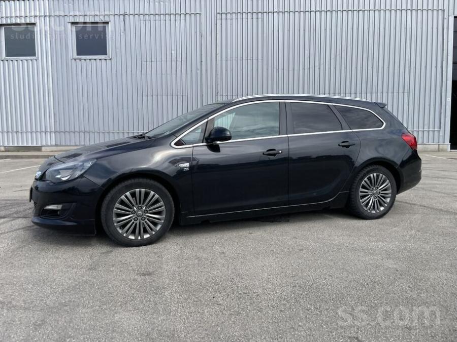 Black Opel Astra 2013 in Riga, with an engine capacity of 1.70 L and mileage of 260 thousand km for 4560 €, photo 4 on AUTOMOTO.COM.LV
