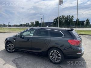 Black Opel Astra 2013 in Riga, with an engine capacity of 1.70 L and mileage of 260 thousand km for 4560 €, photo 7 on AUTOMOTO.COM.LV