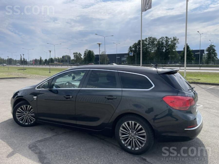 Black Opel Astra 2013 in Riga, with an engine capacity of 1.70 L and mileage of 260 thousand km for 4560 €, photo 7 on AUTOMOTO.COM.LV