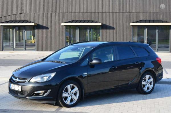 Black Opel Astra 2013 in Siauliai, with an engine capacity of 1.96 L and mileage of 270 thousand km for 4000 €, photo 2 on AUTOMOTO.COM.LV