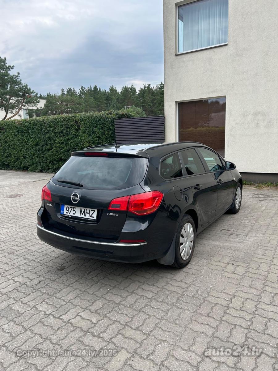 Black Opel Astra 2013 in Tallinn, with an engine capacity of 1.40 L and mileage of 132 thousand km for 5490 €, photo 3 on AUTOMOTO.COM.LV