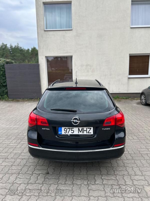 Black Opel Astra 2013 in Tallinn, with an engine capacity of 1.40 L and mileage of 132 thousand km for 5490 €, photo 6 on AUTOMOTO.COM.LV