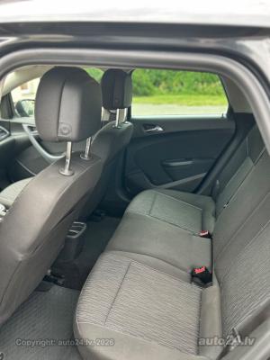 Black Opel Astra 2013 in Tallinn, with an engine capacity of 1.40 L and mileage of 132 thousand km for 5490 €, photo 9 on AUTOMOTO.COM.LV