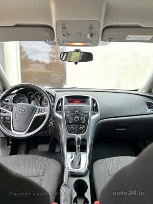 Black Opel Astra 2013 in Tallinn, with an engine capacity of 1.40 L and mileage of 132 thousand km for 5490 €, photo 12 on AUTOMOTO.COM.LV