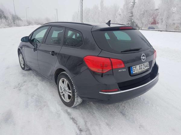Black Opel Astra 2014 in Radviliskis, with an engine capacity of 1.36 L and mileage of 237 thousand km for 4350 €, photo 4 on AUTOMOTO.COM.LV