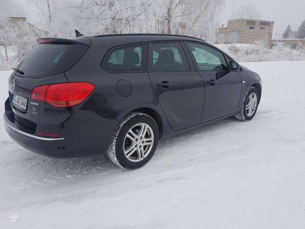Black Opel Astra 2014 in Radviliskis, with an engine capacity of 1.36 L and mileage of 237 thousand km for 4350 €, photo 7 on AUTOMOTO.COM.LV