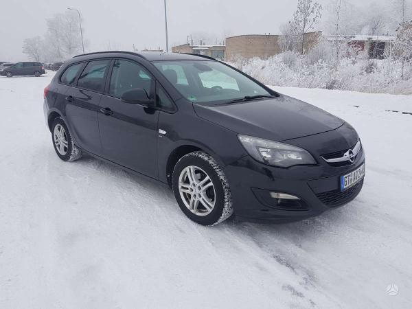 Black Opel Astra 2014 in Radviliskis, with an engine capacity of 1.36 L and mileage of 237 thousand km for 4350 €, photo 9 on AUTOMOTO.COM.LV