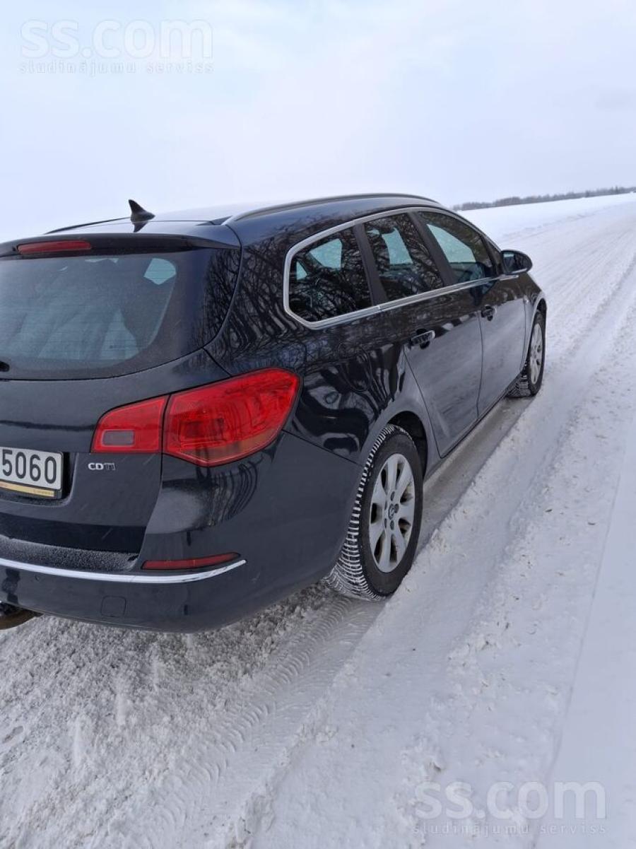 Melns Opel Astra 2014 Rīga, ar dzinēja tilpumu 1.60 L un nobraukumu 261 tūkst. km par 3300 €, foto 5 vietnē AUTOMOTO.COM.LV
