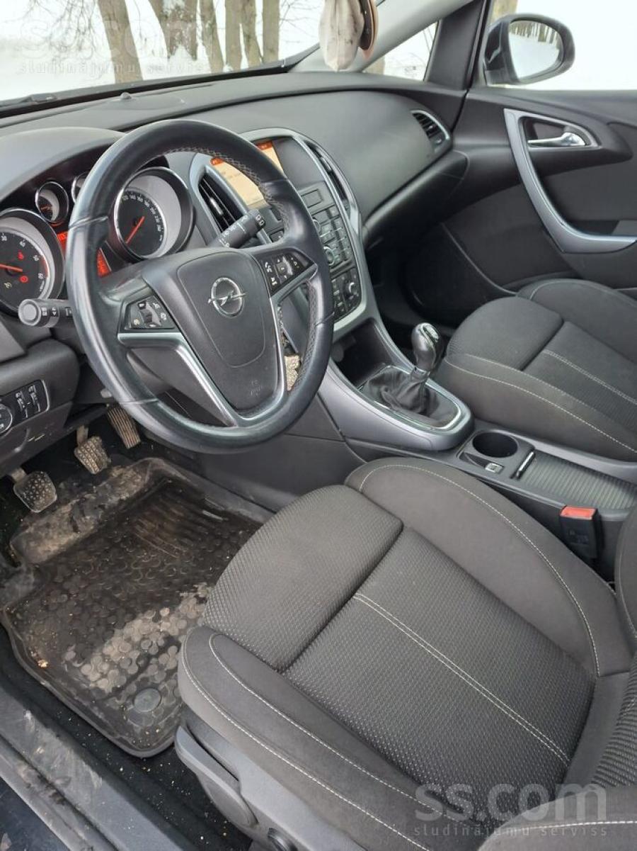 Melns Opel Astra 2014 Rīga, ar dzinēja tilpumu 1.60 L un nobraukumu 261 tūkst. km par 3300 €, foto 7 vietnē AUTOMOTO.COM.LV