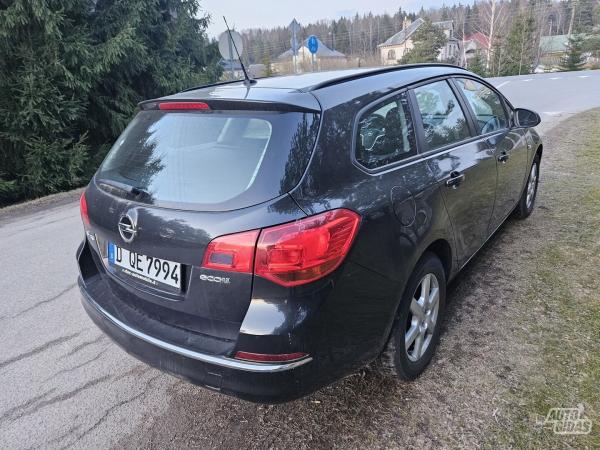 Black Opel Astra 2014 in Mazeikiai, with an engine capacity of 1.60 L and mileage of 223 thousand km for 3150 €, photo 9 on AUTOMOTO.COM.LV
