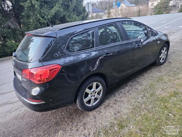 Black Opel Astra 2014 in Mazeikiai, with an engine capacity of 1.60 L and mileage of 223 thousand km for 3150 €, photo 10 on AUTOMOTO.COM.LV