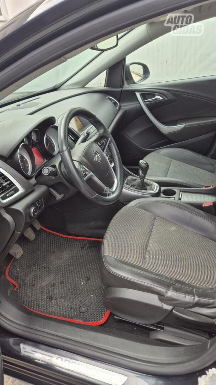 Black Opel Astra 2014 in Kaunas, with an engine capacity of 1.60 L and mileage of 377 thousand km for 3600 €, photo 18 on AUTOMOTO.COM.LV