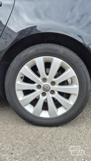 Black Opel Astra 2014 in Kaunas, with an engine capacity of 1.60 L and mileage of 377 thousand km for 3600 €, photo 20 on AUTOMOTO.COM.LV
