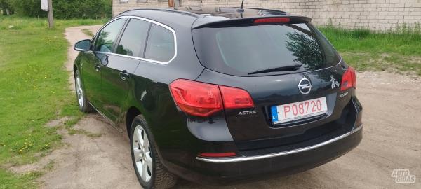 Melns Opel Astra 2014 Viļņa, ar dzinēja tilpumu 1.60 L un nobraukumu 220 tūkst. km par 3450 €, foto 4 vietnē AUTOMOTO.COM.LV