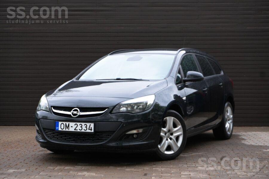 Black Opel Astra 2014 in Riga, with an engine capacity of 2.00 L and mileage of 283 thousand km for 5490 €, photo 1 on AUTOMOTO.COM.LV