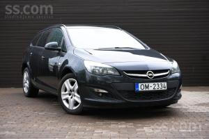 Black Opel Astra 2014 in Riga, with an engine capacity of 2.00 L and mileage of 283 thousand km for 5490 €, photo 3 on AUTOMOTO.COM.LV