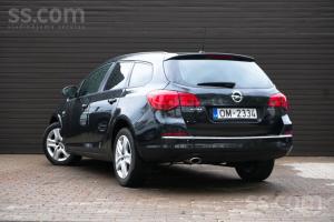 Black Opel Astra 2014 in Riga, with an engine capacity of 2.00 L and mileage of 283 thousand km for 5490 €, photo 5 on AUTOMOTO.COM.LV