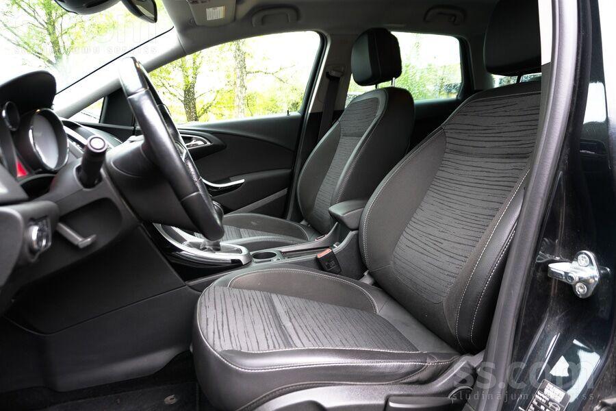 Black Opel Astra 2014 in Riga, with an engine capacity of 2.00 L and mileage of 283 thousand km for 5490 €, photo 7 on AUTOMOTO.COM.LV