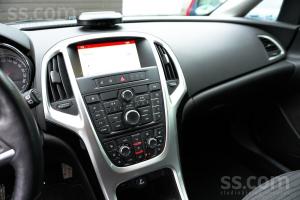 Black Opel Astra 2014 in Riga, with an engine capacity of 2.00 L and mileage of 283 thousand km for 5490 €, photo 8 on AUTOMOTO.COM.LV