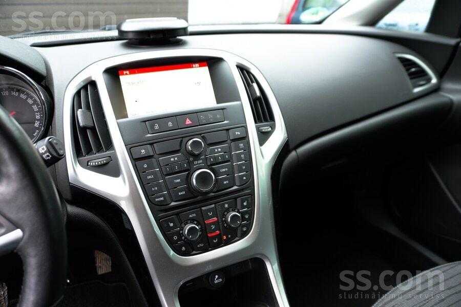 Black Opel Astra 2014 in Riga, with an engine capacity of 2.00 L and mileage of 283 thousand km for 5490 €, photo 8 on AUTOMOTO.COM.LV