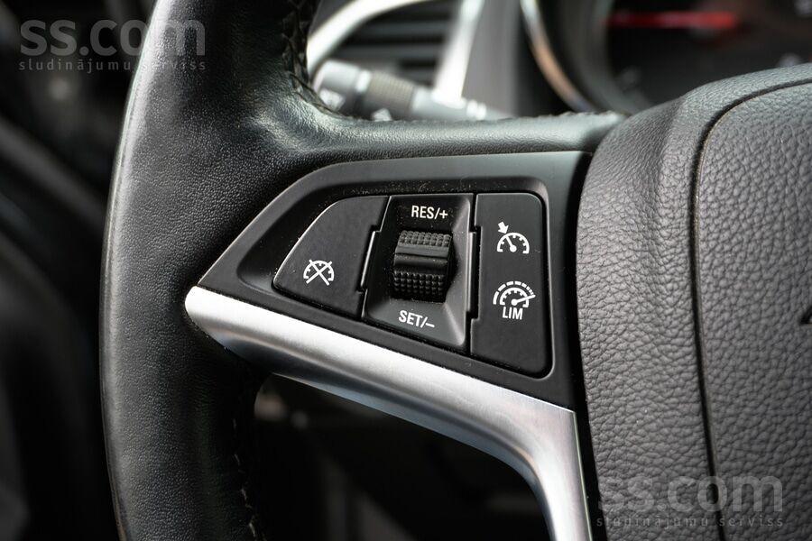 Black Opel Astra 2014 in Riga, with an engine capacity of 2.00 L and mileage of 283 thousand km for 5490 €, photo 10 on AUTOMOTO.COM.LV