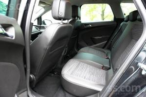 Black Opel Astra 2014 in Riga, with an engine capacity of 2.00 L and mileage of 283 thousand km for 5490 €, photo 12 on AUTOMOTO.COM.LV