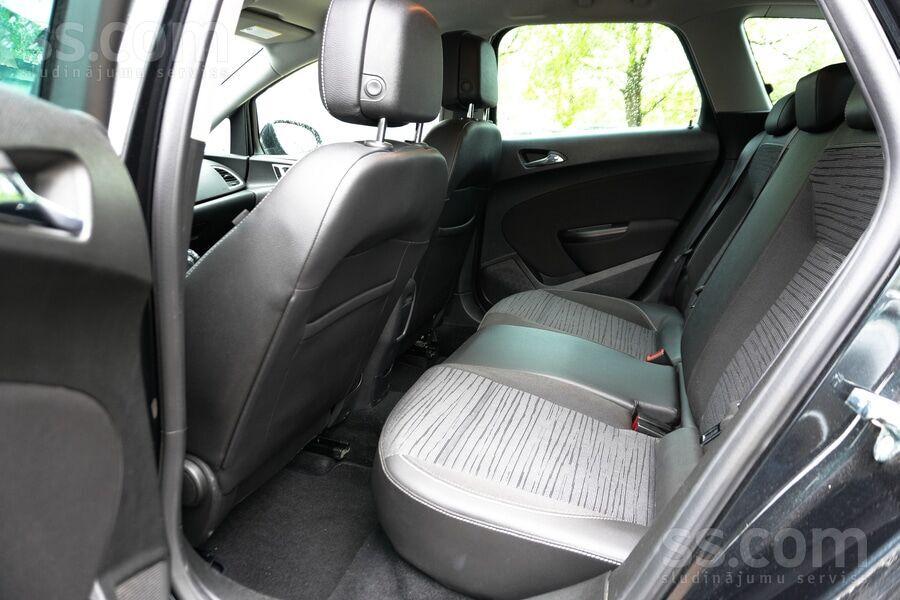 Black Opel Astra 2014 in Riga, with an engine capacity of 2.00 L and mileage of 283 thousand km for 5490 €, photo 12 on AUTOMOTO.COM.LV