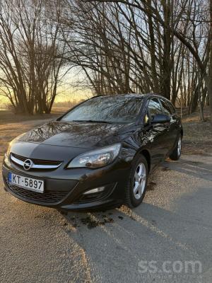 Black Opel Astra 2014 in Riga, with an engine capacity of 2.00 L and mileage of 259 thousand km for 4800 €, photo  on AUTOMOTO.COM.LV