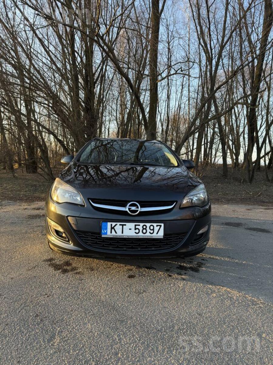 Black Opel Astra 2014 in Riga, with an engine capacity of 2.00 L and mileage of 259 thousand km for 4800 €, photo 3 on AUTOMOTO.COM.LV