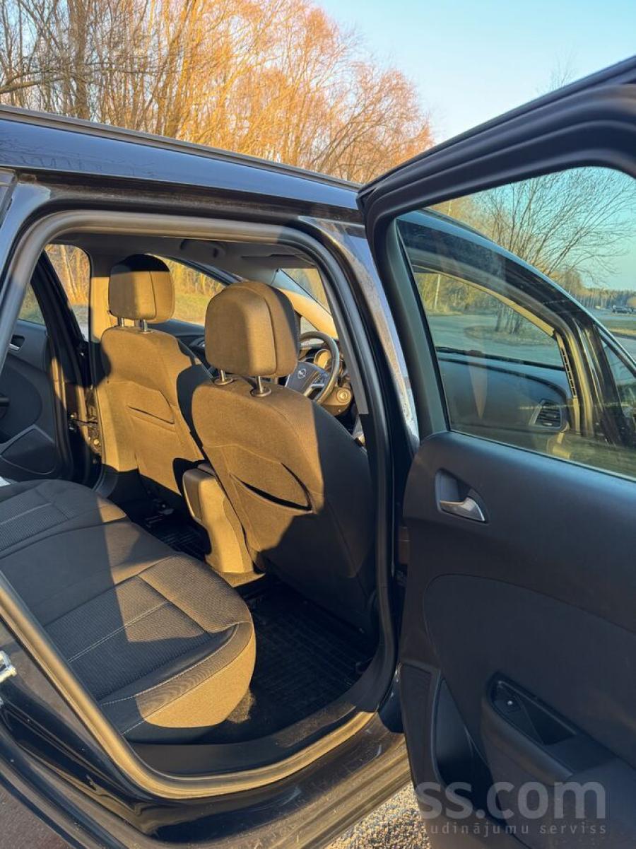Black Opel Astra 2014 in Riga, with an engine capacity of 2.00 L and mileage of 259 thousand km for 4800 €, photo 10 on AUTOMOTO.COM.LV