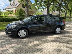 Black Opel Astra 2014 in Valmiera, with an engine capacity of 1.70 L and mileage of 240 thousand km for 2950 €, photo 6 on AUTOMOTO.COM.LV