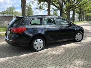 Black Opel Astra 2014 in Valmiera, with an engine capacity of 1.70 L and mileage of 240 thousand km for 2950 €, photo 12 on AUTOMOTO.COM.LV