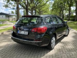 Black Opel Astra 2014 in Valmiera, with an engine capacity of 1.70 L and mileage of 240 thousand km for 2950 €, photo 14 on AUTOMOTO.COM.LV