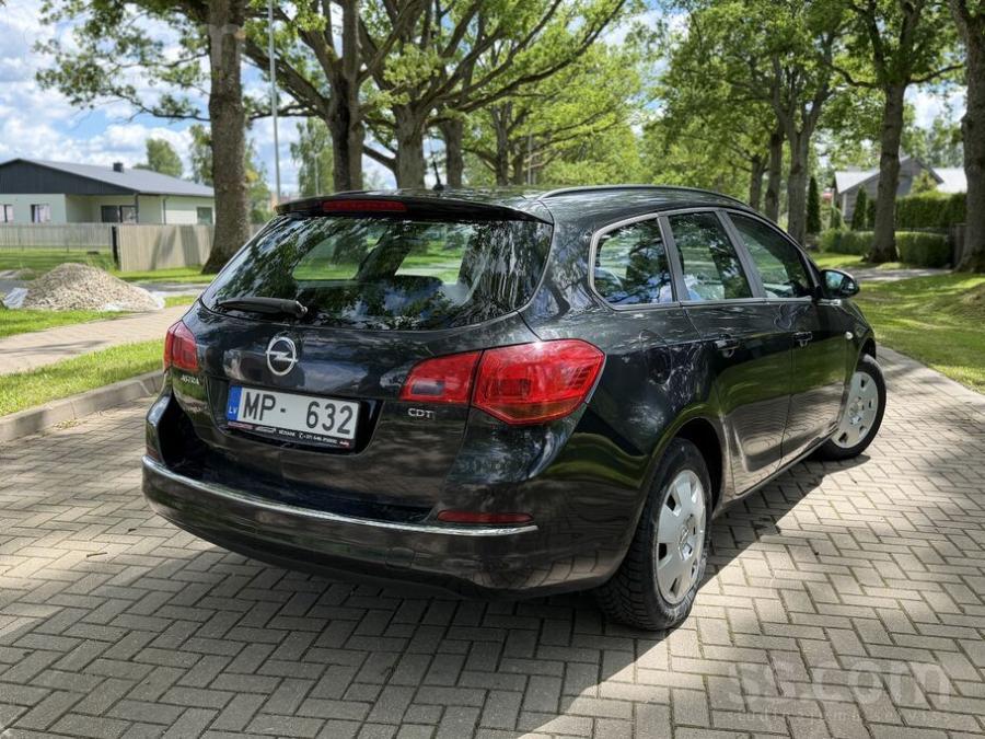 Black Opel Astra 2014 in Valmiera, with an engine capacity of 1.70 L and mileage of 240 thousand km for 2950 €, photo 14 on AUTOMOTO.COM.LV