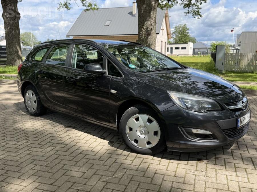 Black Opel Astra 2014 in Valmiera, with an engine capacity of 1.70 L and mileage of 240 thousand km for 2950 €, photo 16 on AUTOMOTO.COM.LV