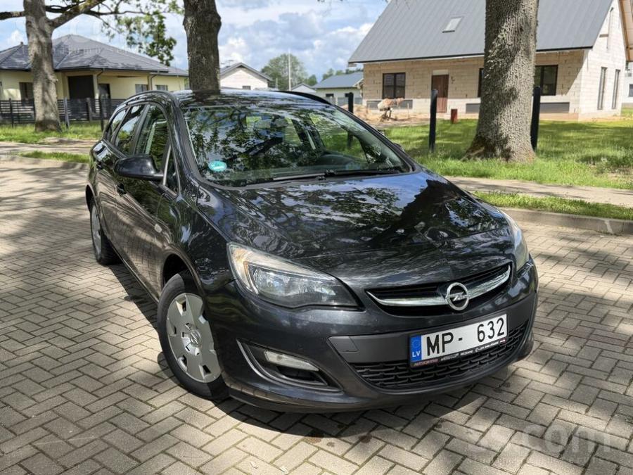 Black Opel Astra 2014 in Valmiera, with an engine capacity of 1.70 L and mileage of 240 thousand km for 2950 €, photo 17 on AUTOMOTO.COM.LV