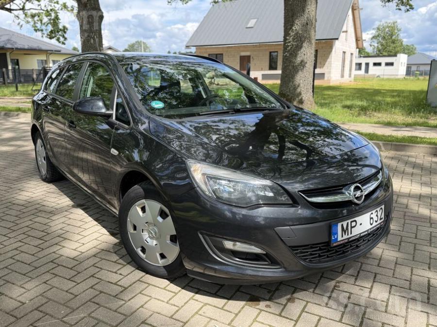 Black Opel Astra 2014 in Valmiera, with an engine capacity of 1.70 L and mileage of 240 thousand km for 2950 €, photo 18 on AUTOMOTO.COM.LV
