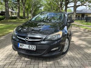 Black Opel Astra 2014 in Valmiera, with an engine capacity of 1.70 L and mileage of 240 thousand km for 2950 €, photo 19 on AUTOMOTO.COM.LV
