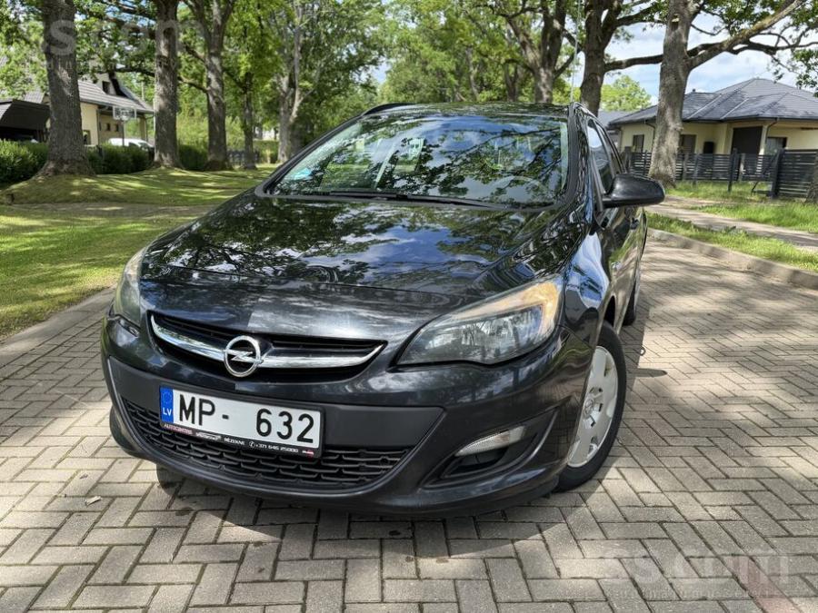 Black Opel Astra 2014 in Valmiera, with an engine capacity of 1.70 L and mileage of 240 thousand km for 2950 €, photo 19 on AUTOMOTO.COM.LV