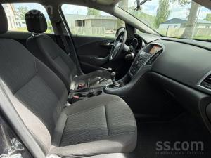 Black Opel Astra 2014 in Valmiera, with an engine capacity of 1.70 L and mileage of 240 thousand km for 2950 €, photo 24 on AUTOMOTO.COM.LV