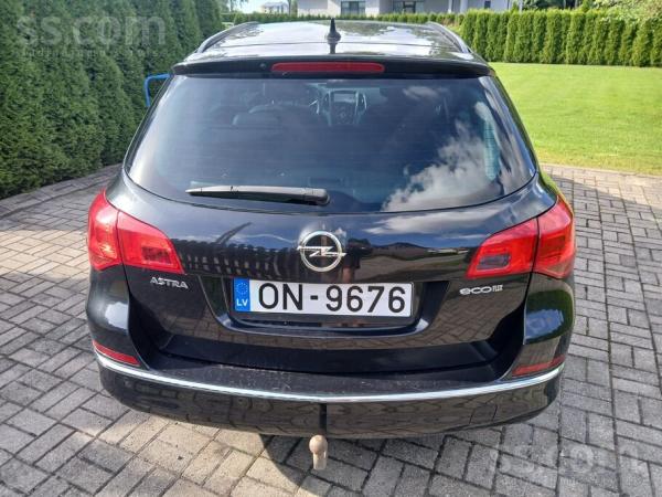 Melns Opel Astra 2014 Rīga, ar dzinēja tilpumu 1.60 L un nobraukumu 355 tūkst. km par 1500 €, foto 4 vietnē AUTOMOTO.COM.LV
