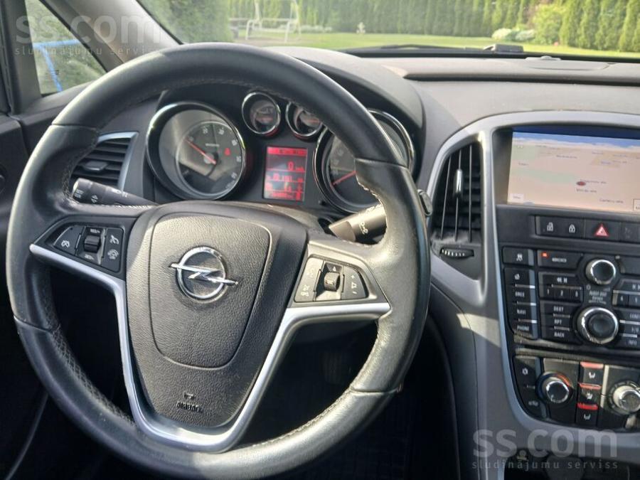 Melns Opel Astra 2014 Rīga, ar dzinēja tilpumu 1.60 L un nobraukumu 355 tūkst. km par 1500 €, foto 6 vietnē AUTOMOTO.COM.LV