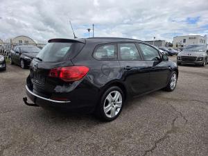 Black Opel Astra 2014 in Marijampole, with an engine capacity of 1.36 L and mileage of 187 thousand km for 3900 €, photo 5 on AUTOMOTO.COM.LV