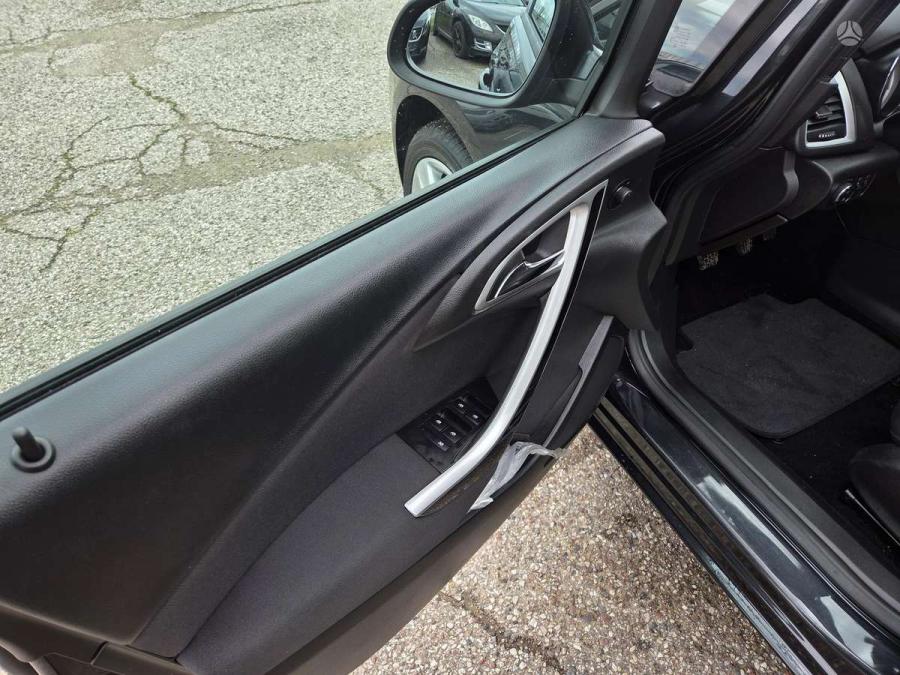 Black Opel Astra 2014 in Marijampole, with an engine capacity of 1.36 L and mileage of 187 thousand km for 3900 €, photo 10 on AUTOMOTO.COM.LV